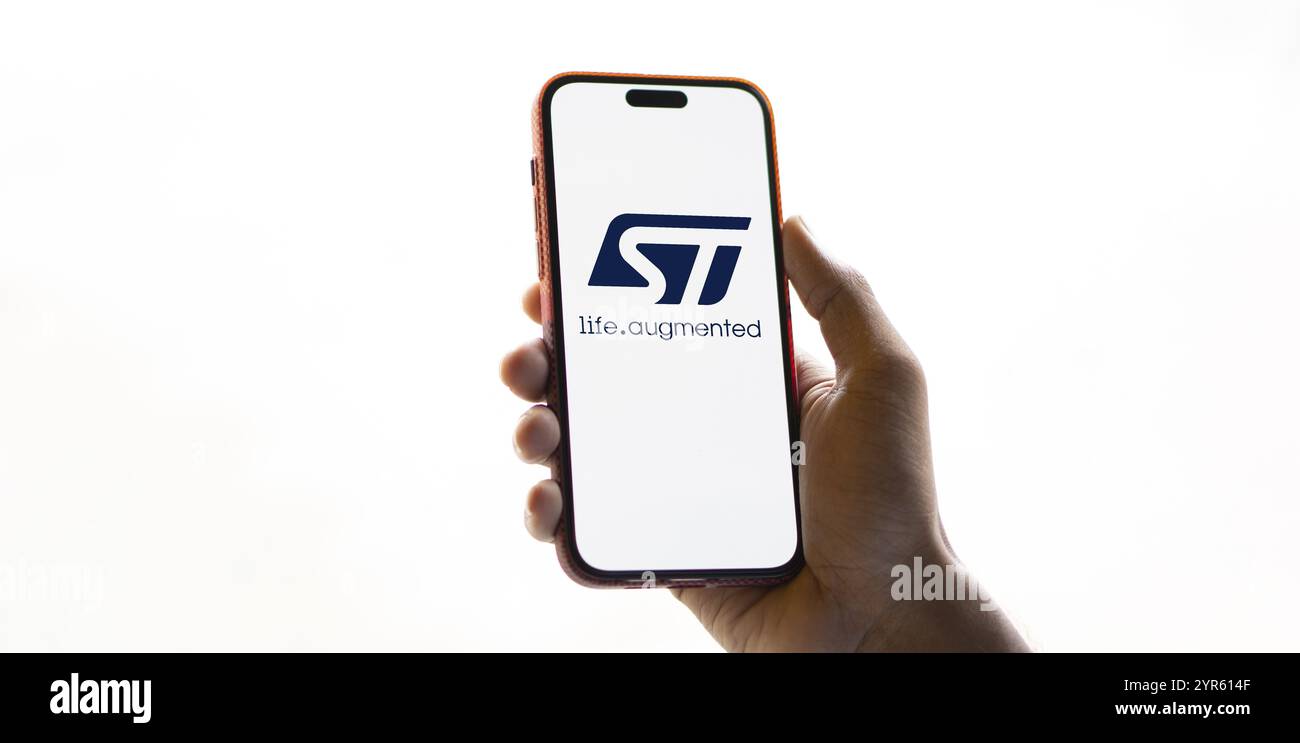 STMicroelectronics logo is displayed on smartphone. STMicroelectronics ...