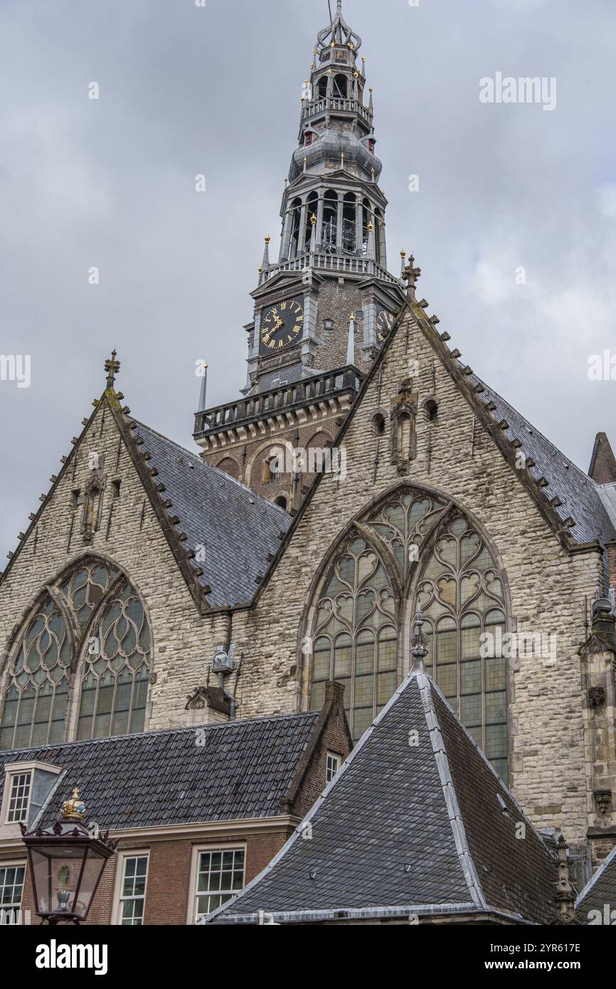 Historic church building with towering church roof, Gothic windows and ...
