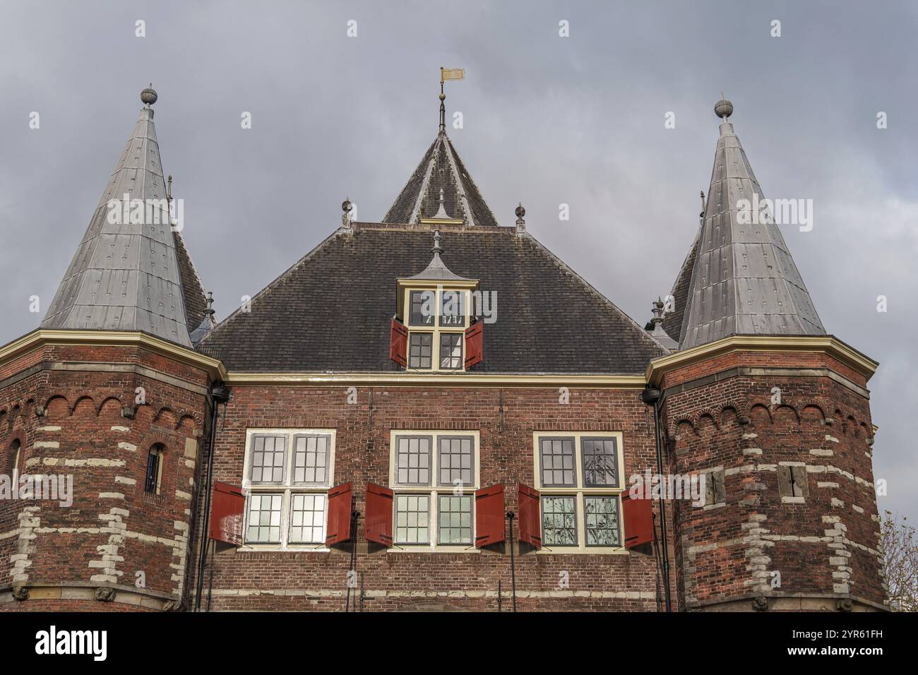 Brick house with towers and windows, artistically photographed ...