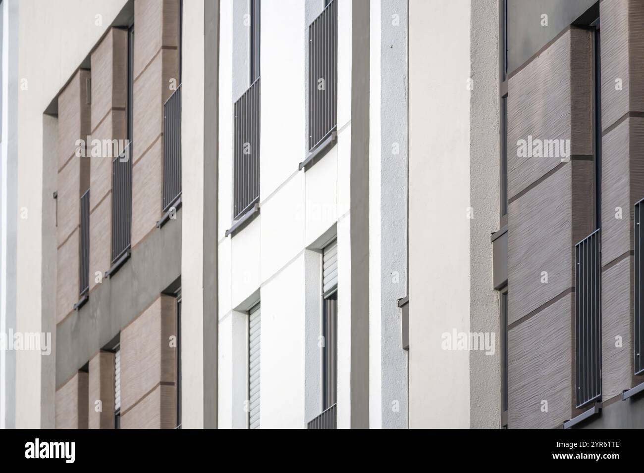 Facade of an modern large house, wall with windows Stock Photo - Alamy
