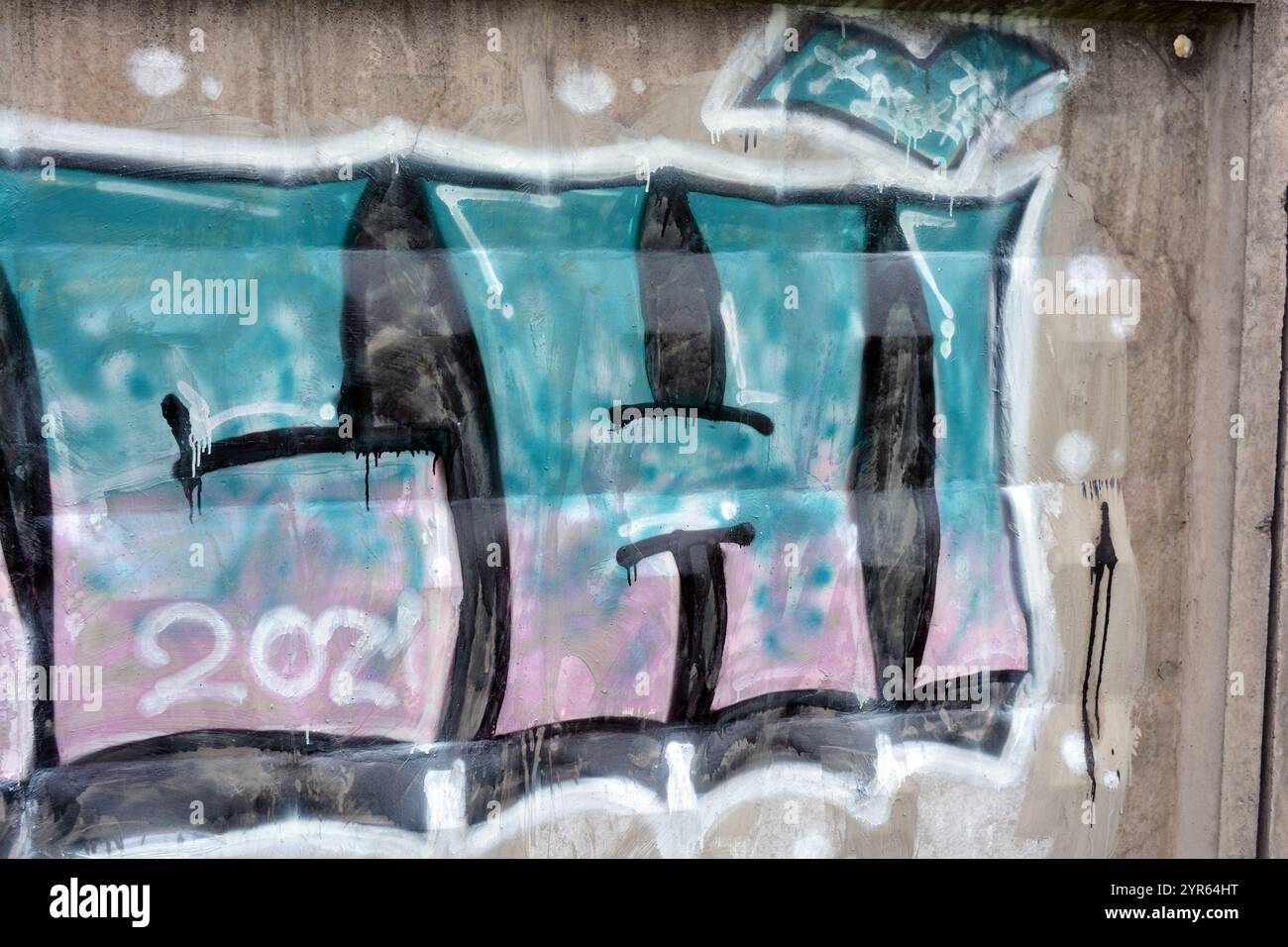 An old water fountain with painting on the wall hi-res stock ...