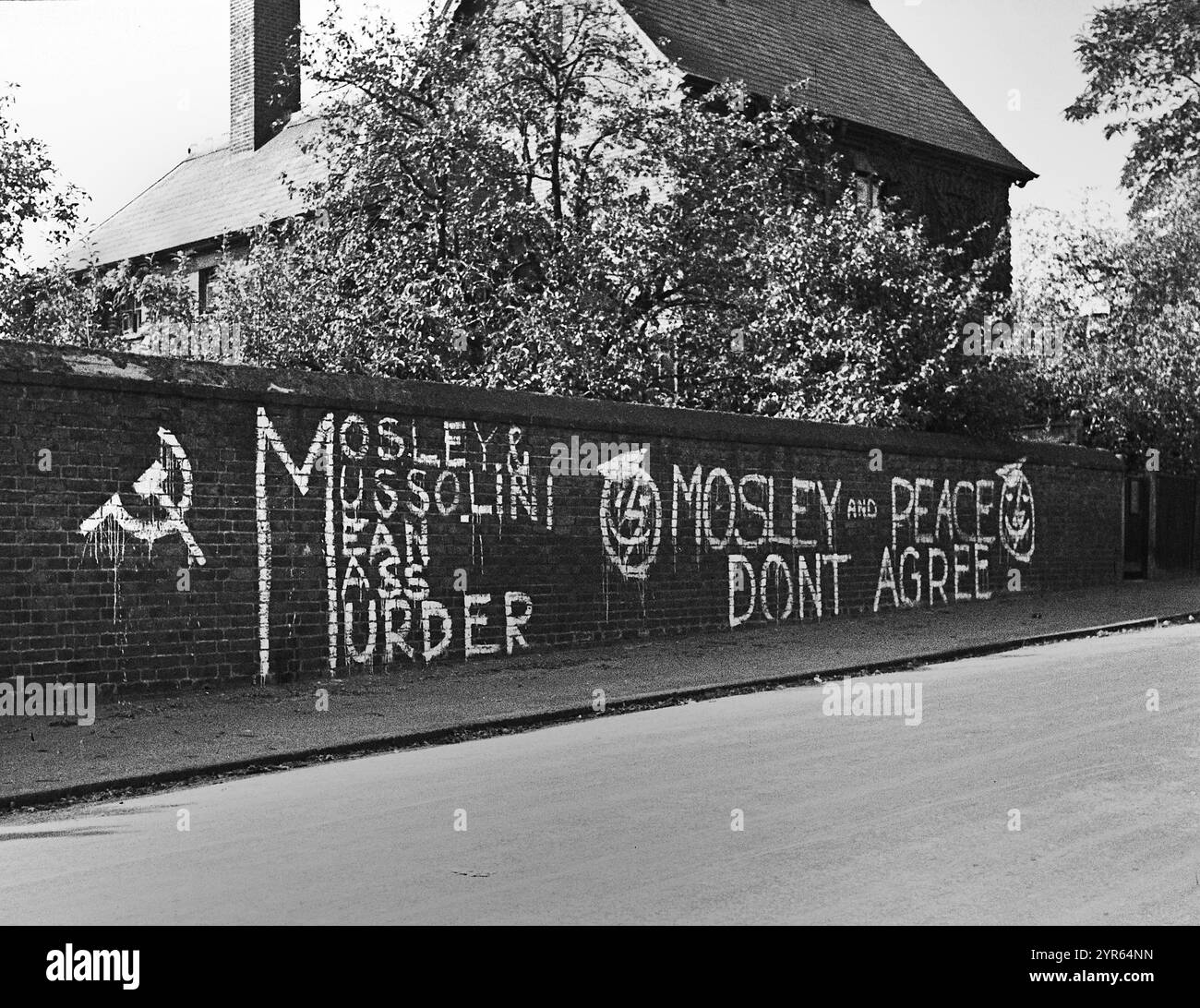 Anti-fascist,slogans,graffiti on wall 1930's Stock Photo - Alamy