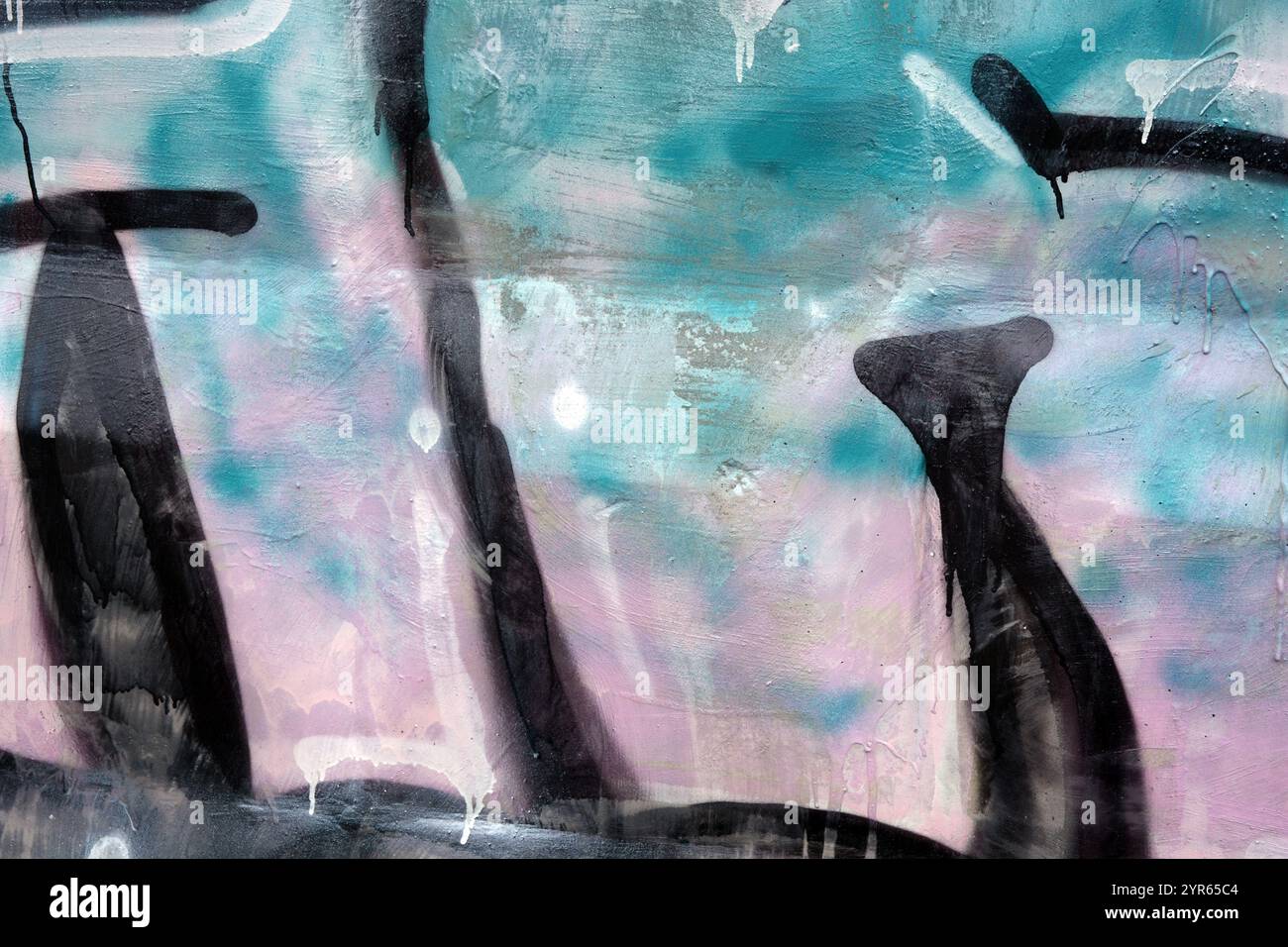 An old water fountain with painting on the wall hi-res stock ...