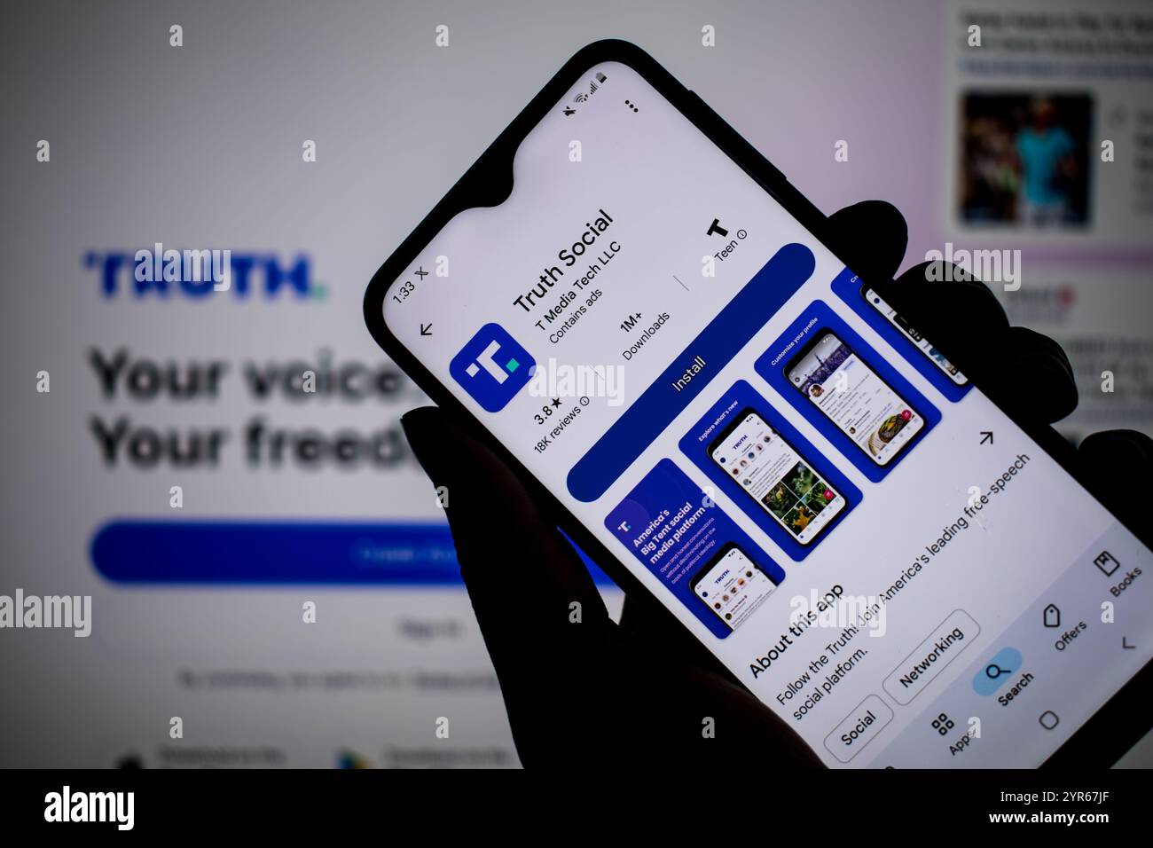 SEATTLE, WA, USA - APR 3, 2025: A man holds smartphone with Truth ...