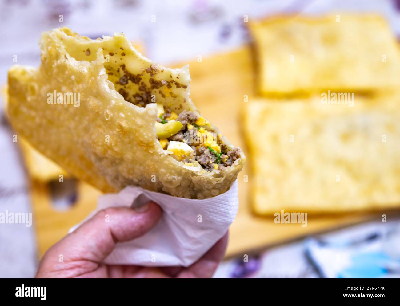 Traditional Brazilian fried pastry stuffed with ground beef. "Pastel de ...