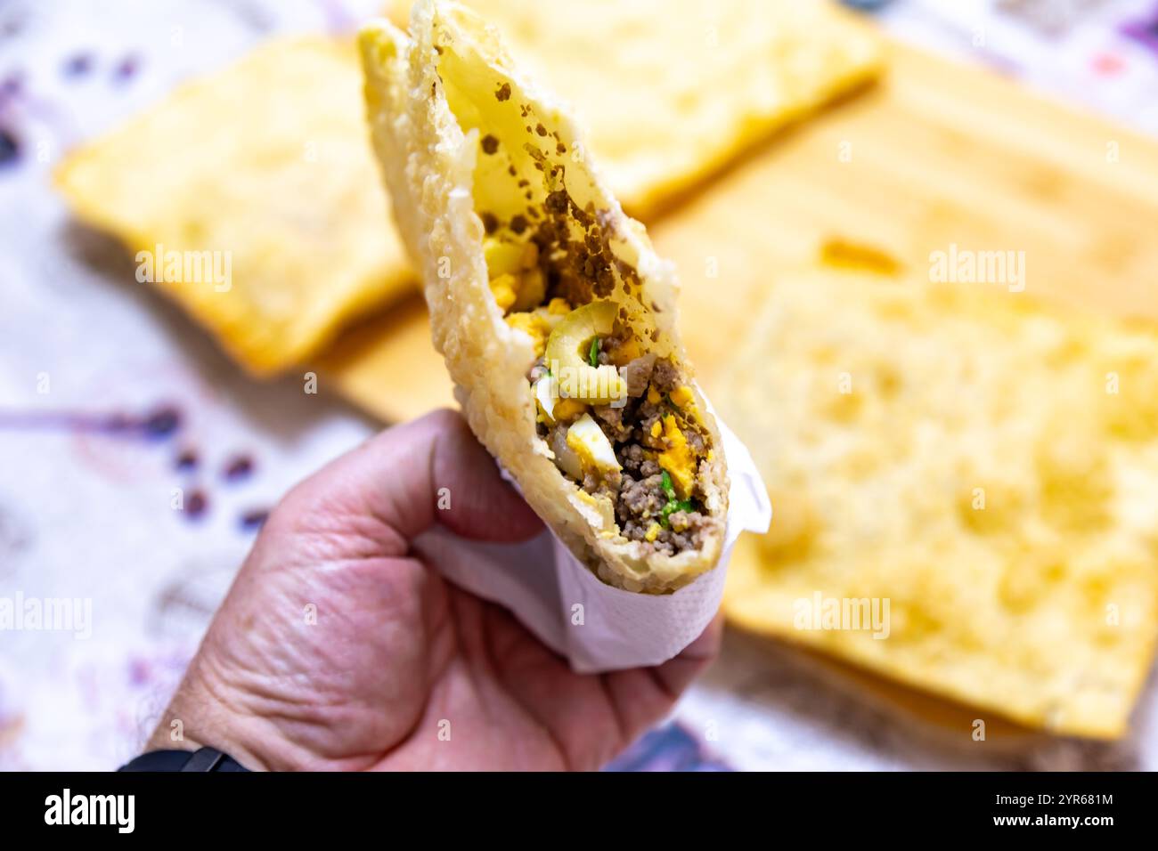 Traditional Brazilian fried pastry stuffed with ground beef. "Pastel de ...