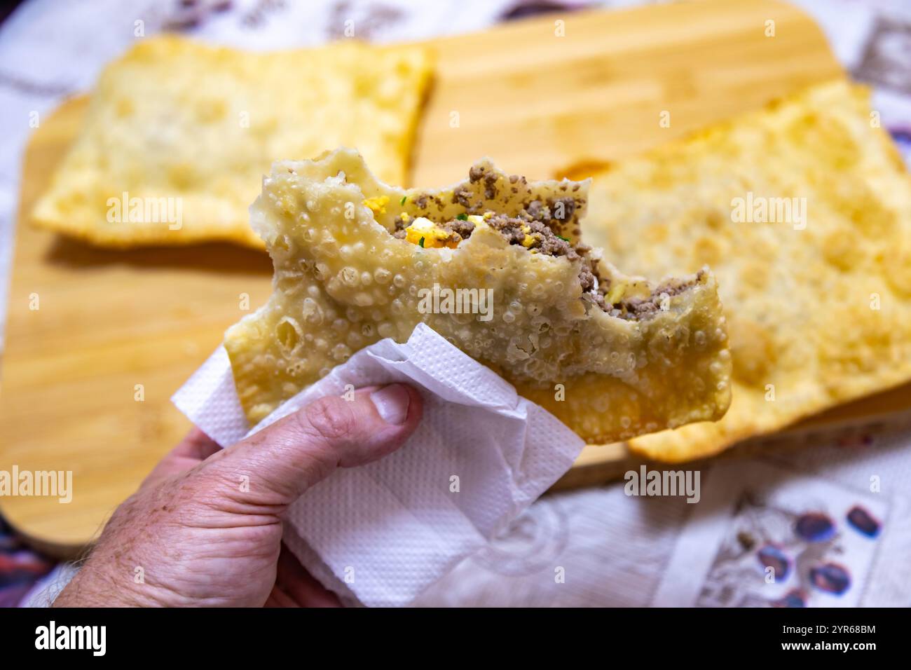 Traditional Brazilian fried pastry stuffed with ground beef. "Pastel de ...