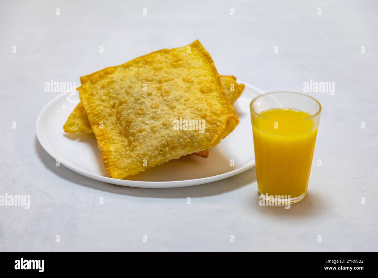 Traditional Brazilian fried pastry stuffed with ground beef. "Pastel de ...