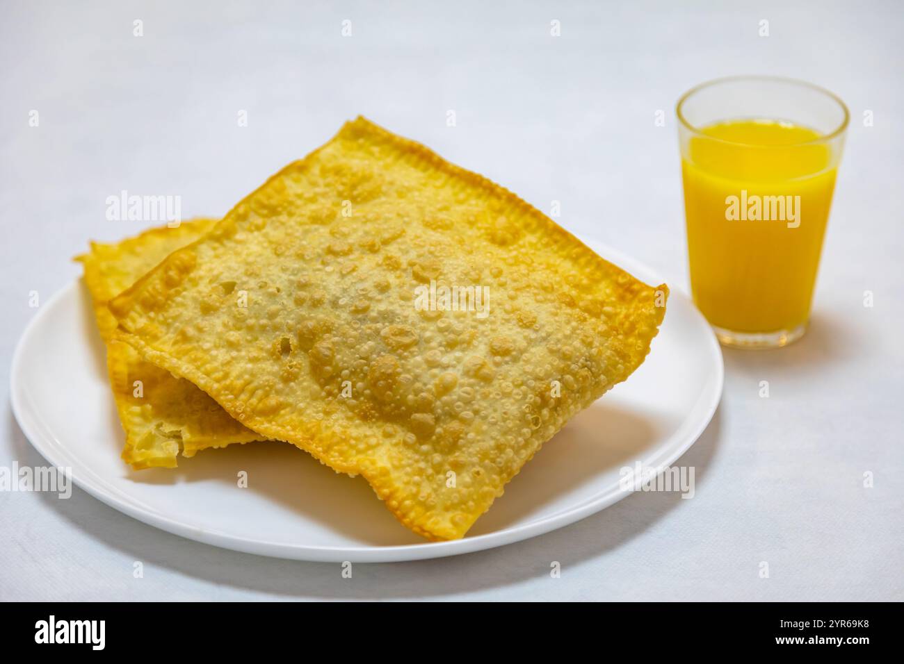 Traditional Brazilian fried pastry stuffed with ground beef. "Pastel de ...