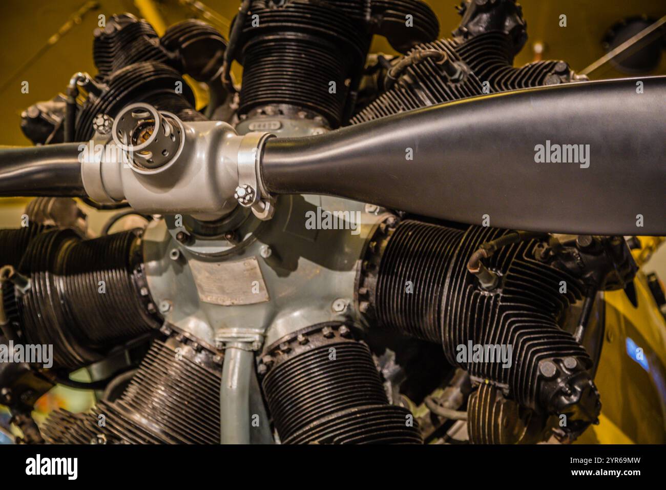 The propeller of an old airplane is shown in detail, with its many ...