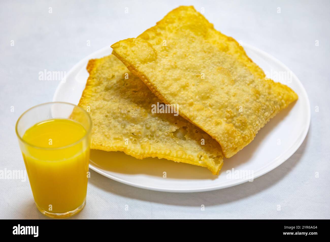 Traditional Brazilian fried pastry stuffed with ground beef. "Pastel de ...