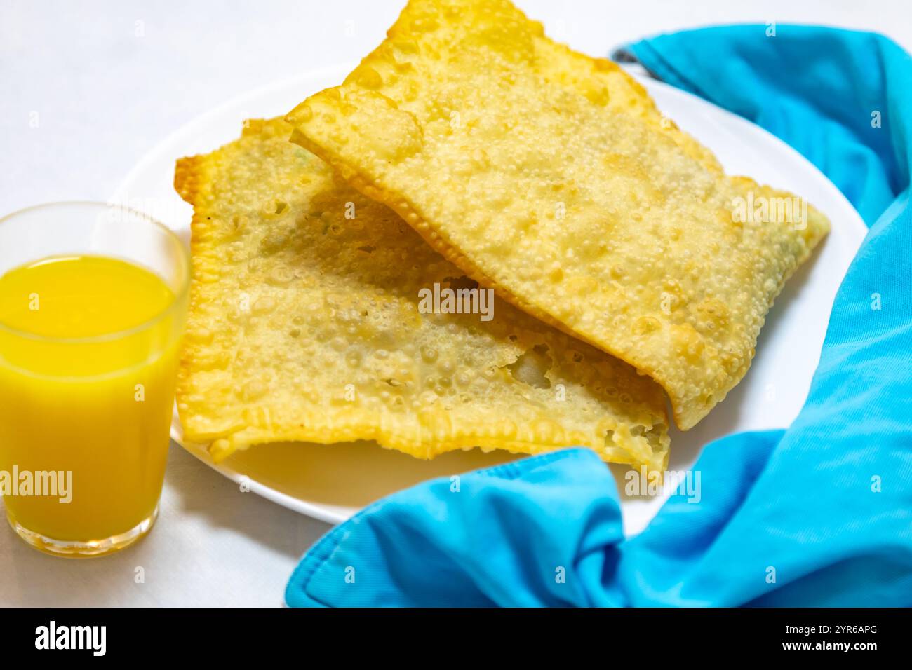Traditional Brazilian fried pastry stuffed with ground beef. "Pastel de ...