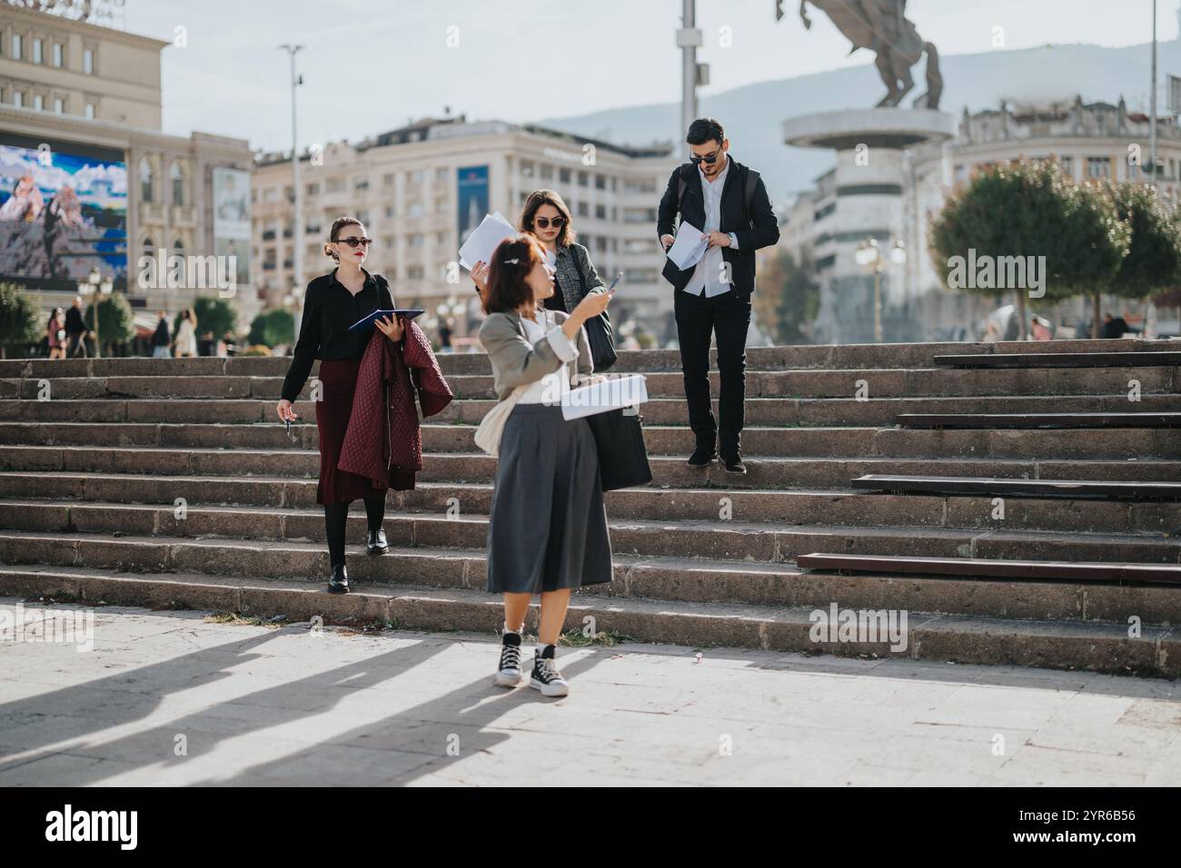 Business people communicating outside in urban environment Stock Photo ...
