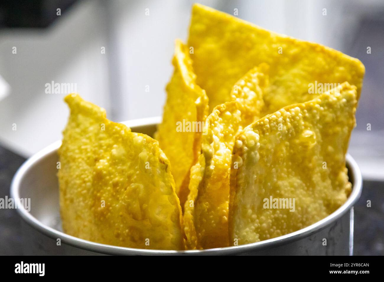 Traditional Brazilian fried pastry stuffed with ground beef. "Pastel de ...