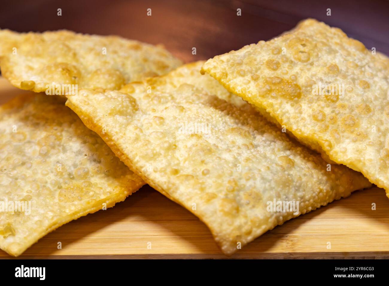 Traditional Brazilian fried pastry stuffed with ground beef. "Pastel de ...