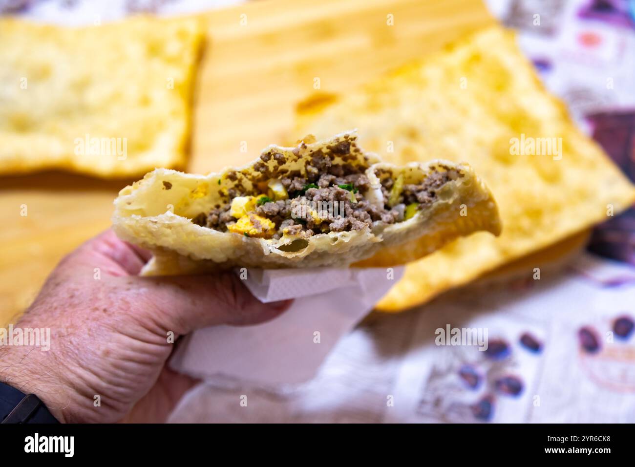 Traditional Brazilian fried pastry stuffed with ground beef. "Pastel de ...