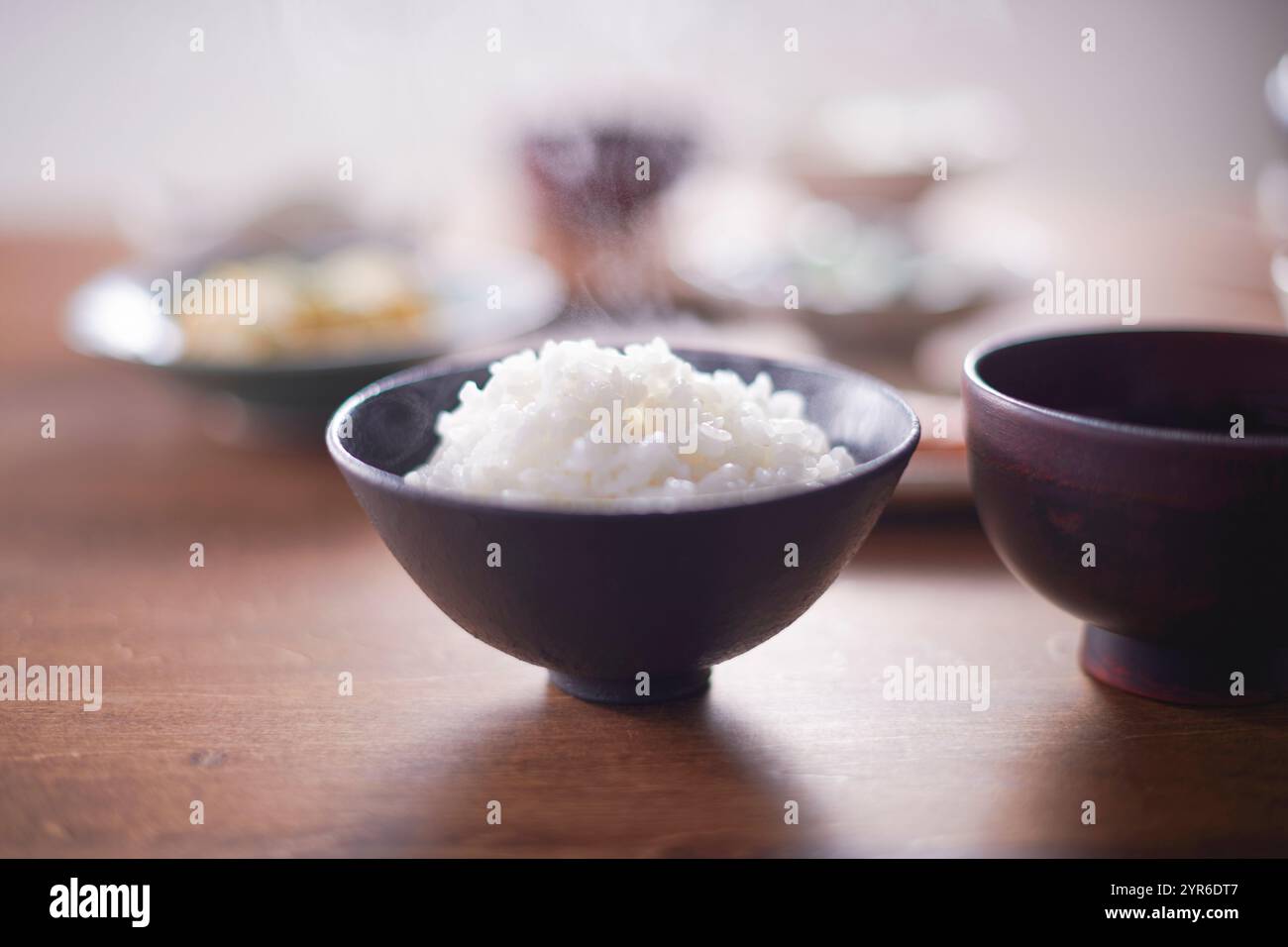 Family eating rice cuisine hi-res stock photography and images - Alamy