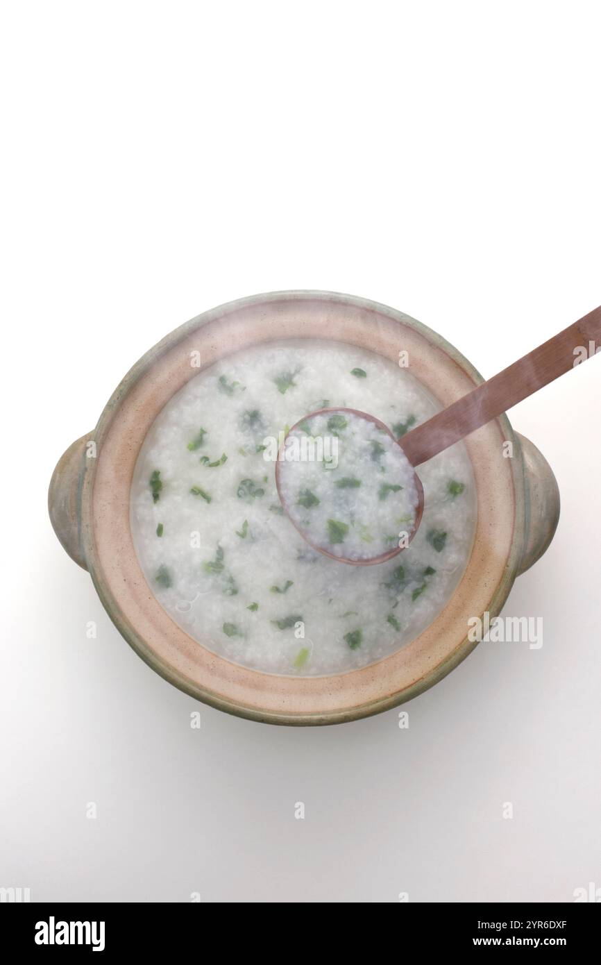 Earthenware and rice gruel with seven herbs Stock Photo - Alamy