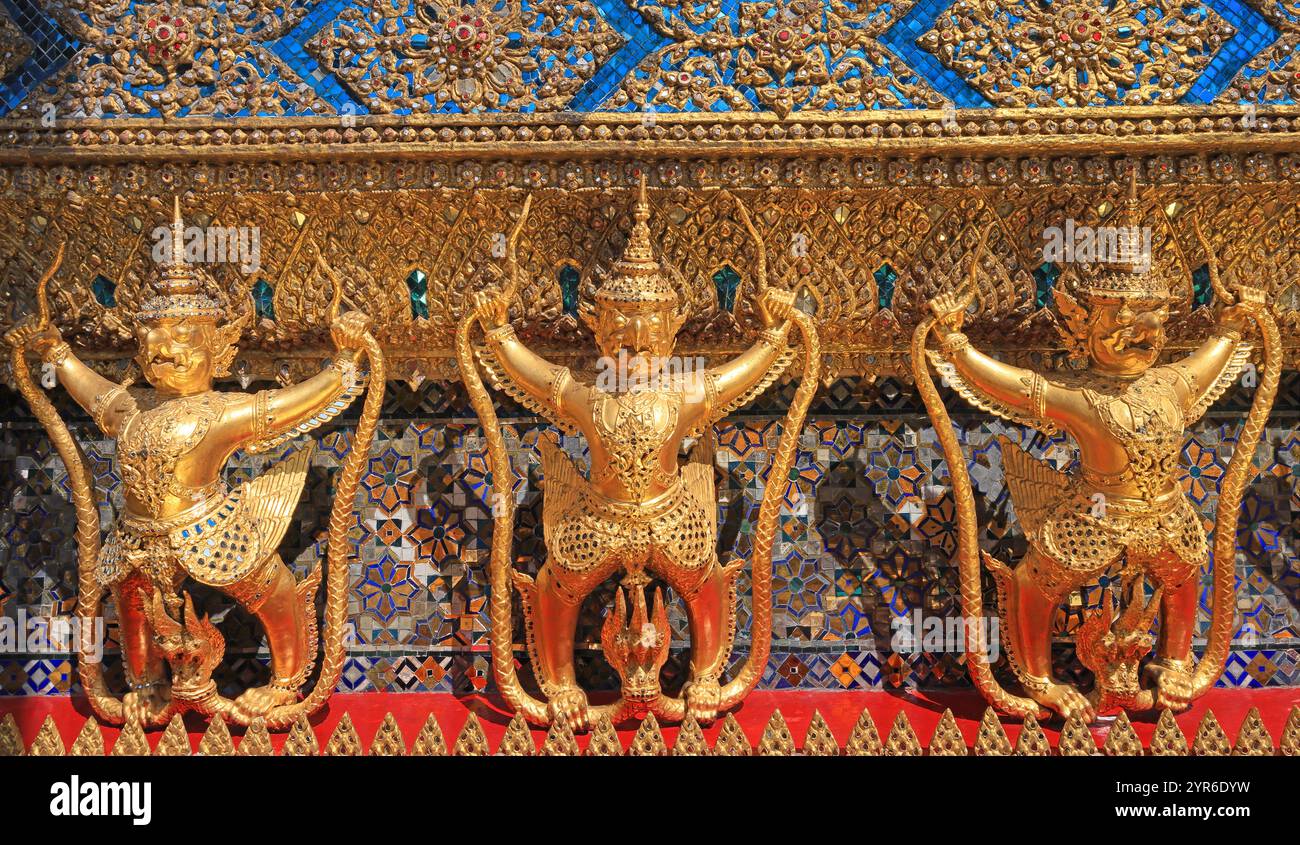 Yaksha Demon Statues holding the golden chedi in the Temple of the ...