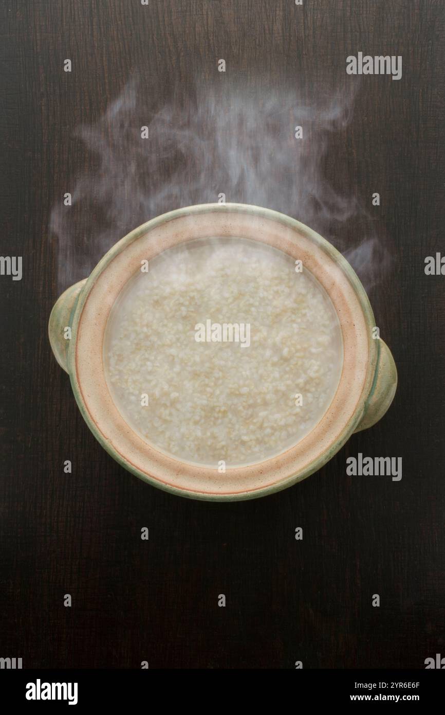 Brown rice gruel Stock Photo - Alamy
