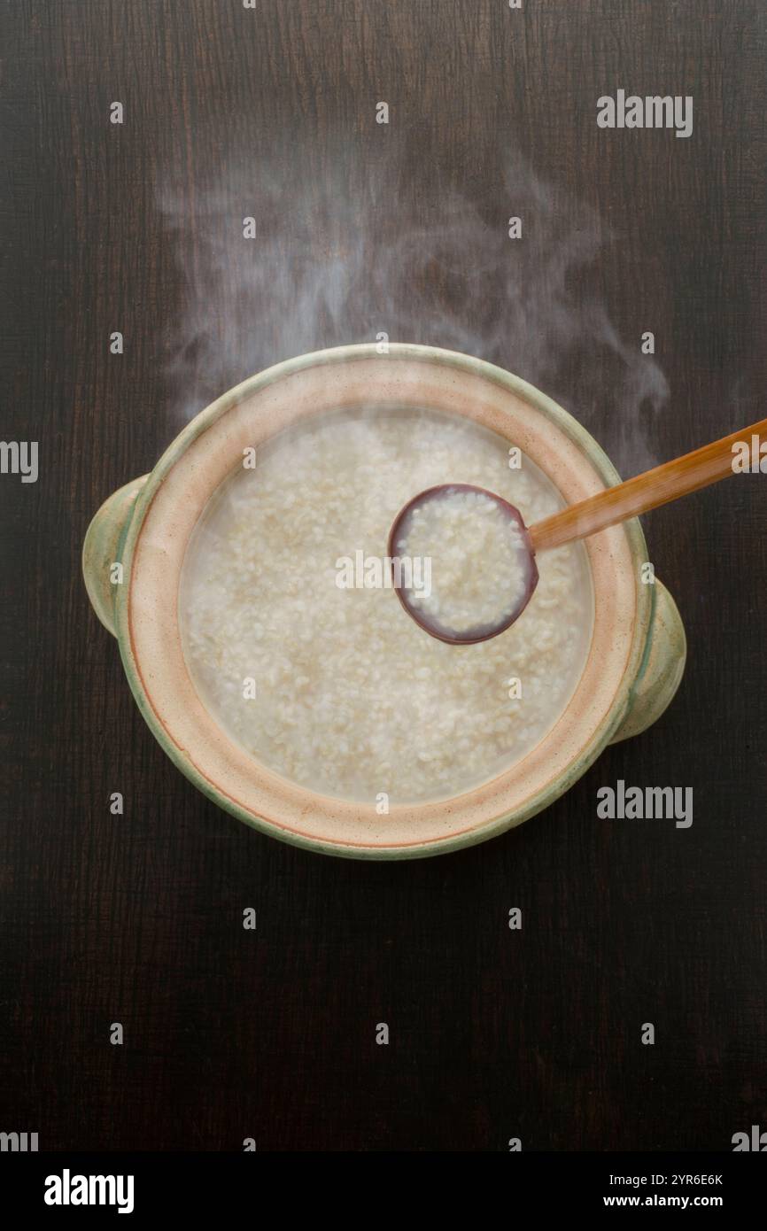 Brown rice gruel Stock Photo - Alamy