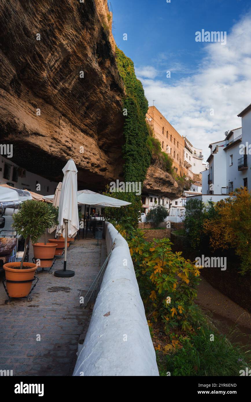 Buildings are integrated into rock formations in Setenil De Las Bodegas ...