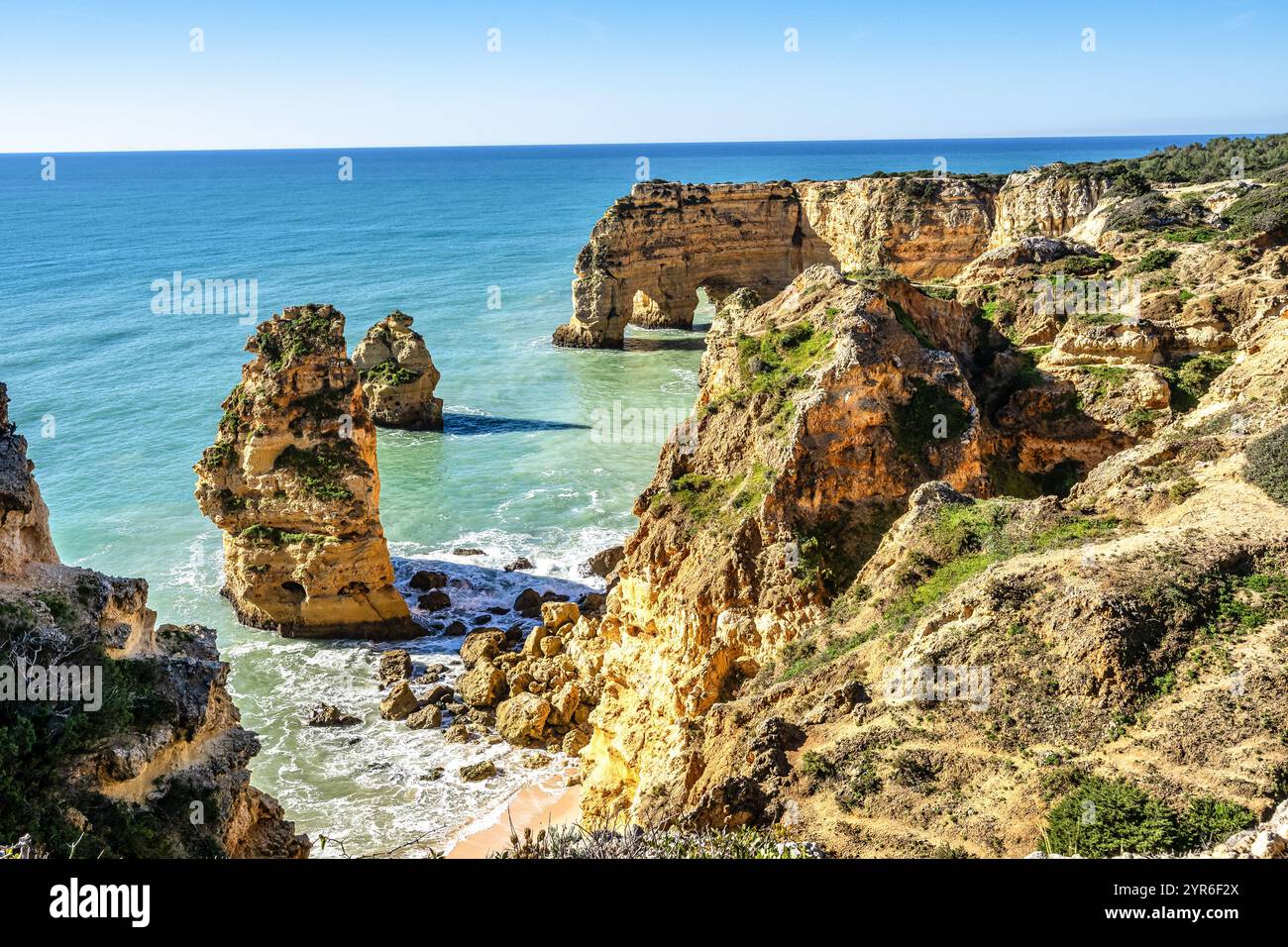Praia da Marinha Beach among rock islets and cliffs seen from Seven ...