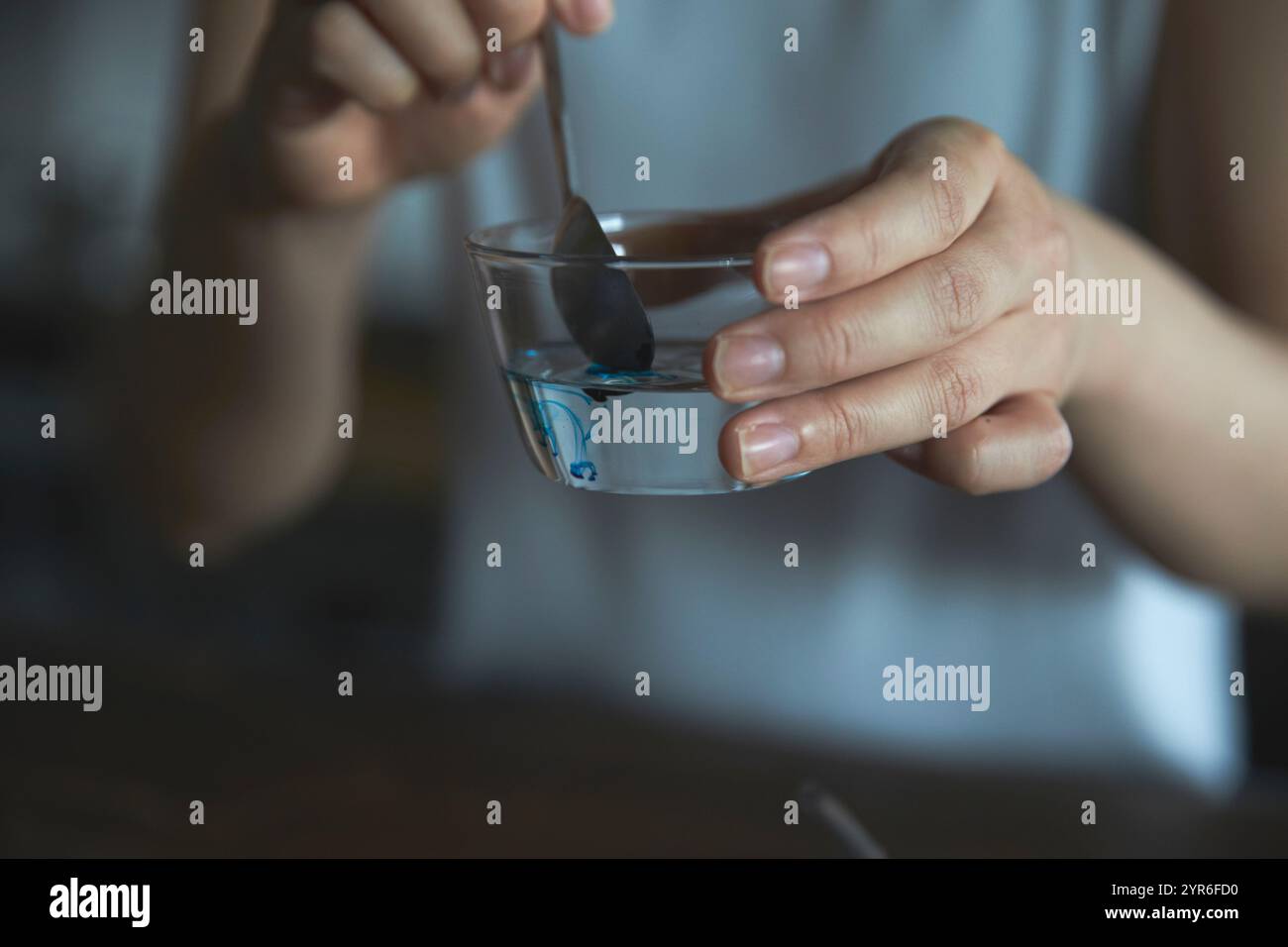 Making colouring water with food colouring 2 Stock Photo - Alamy