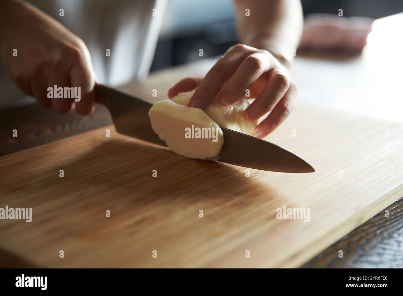 Cut the yam 1 Stock Photo - Alamy