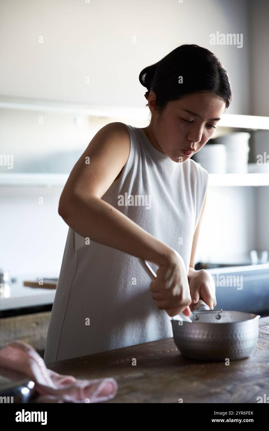 Woman hand add sugar mix hi-res stock photography and images - Alamy