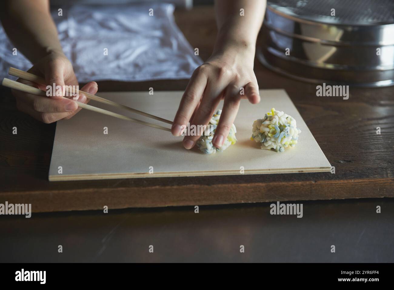 Putting the formed kinton on the stand1 Stock Photo - Alamy