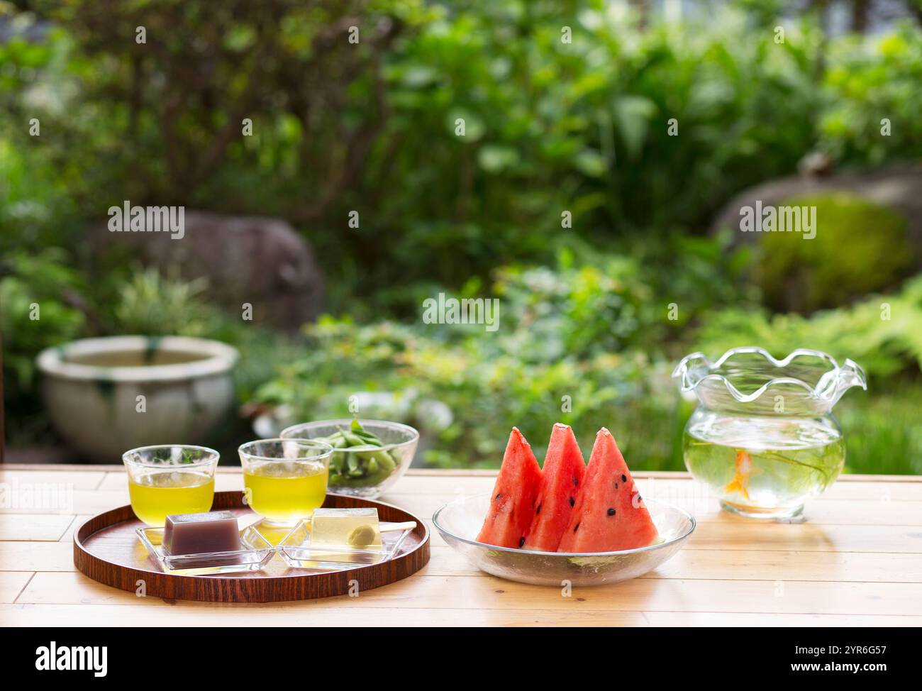 Goldfish bowl, water melon, cold tea and mizuyokan on the veranda Stock ...