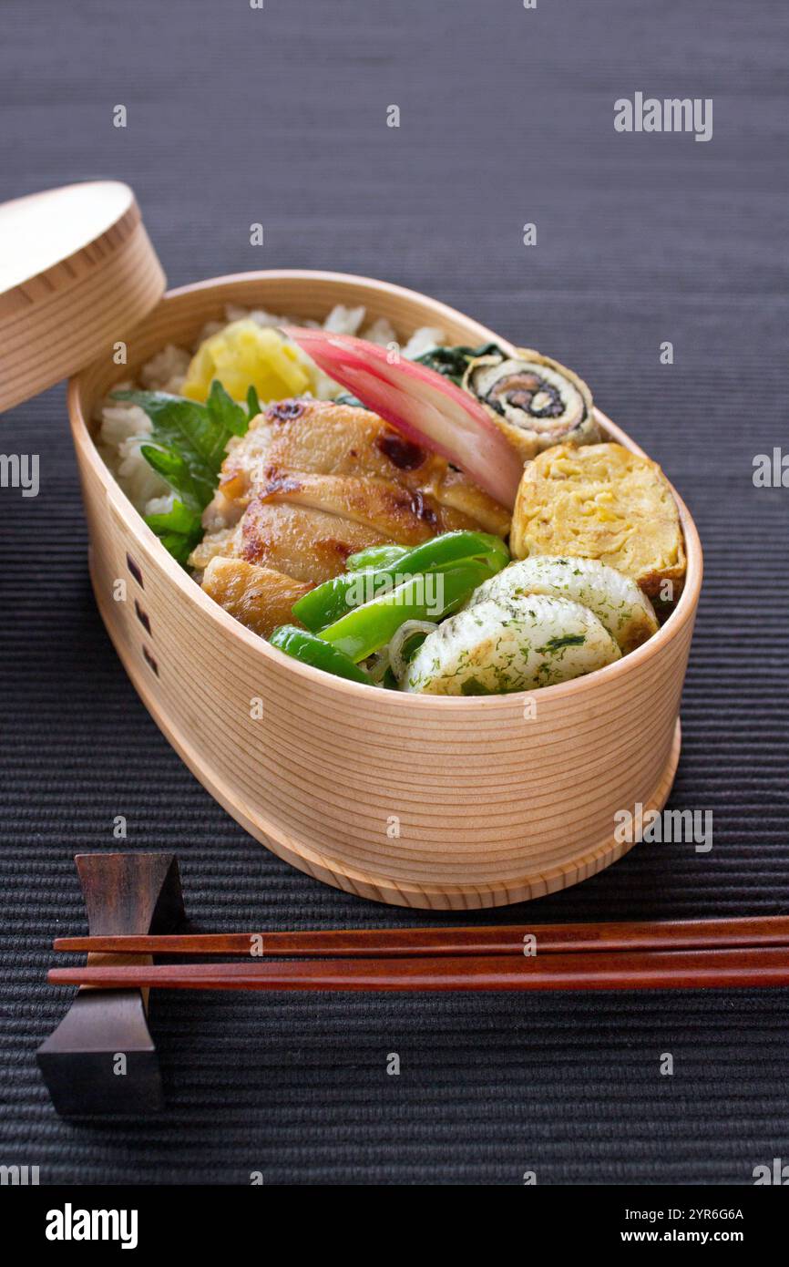 Salt malt grilled chicken Bento box Stock Photo - Alamy
