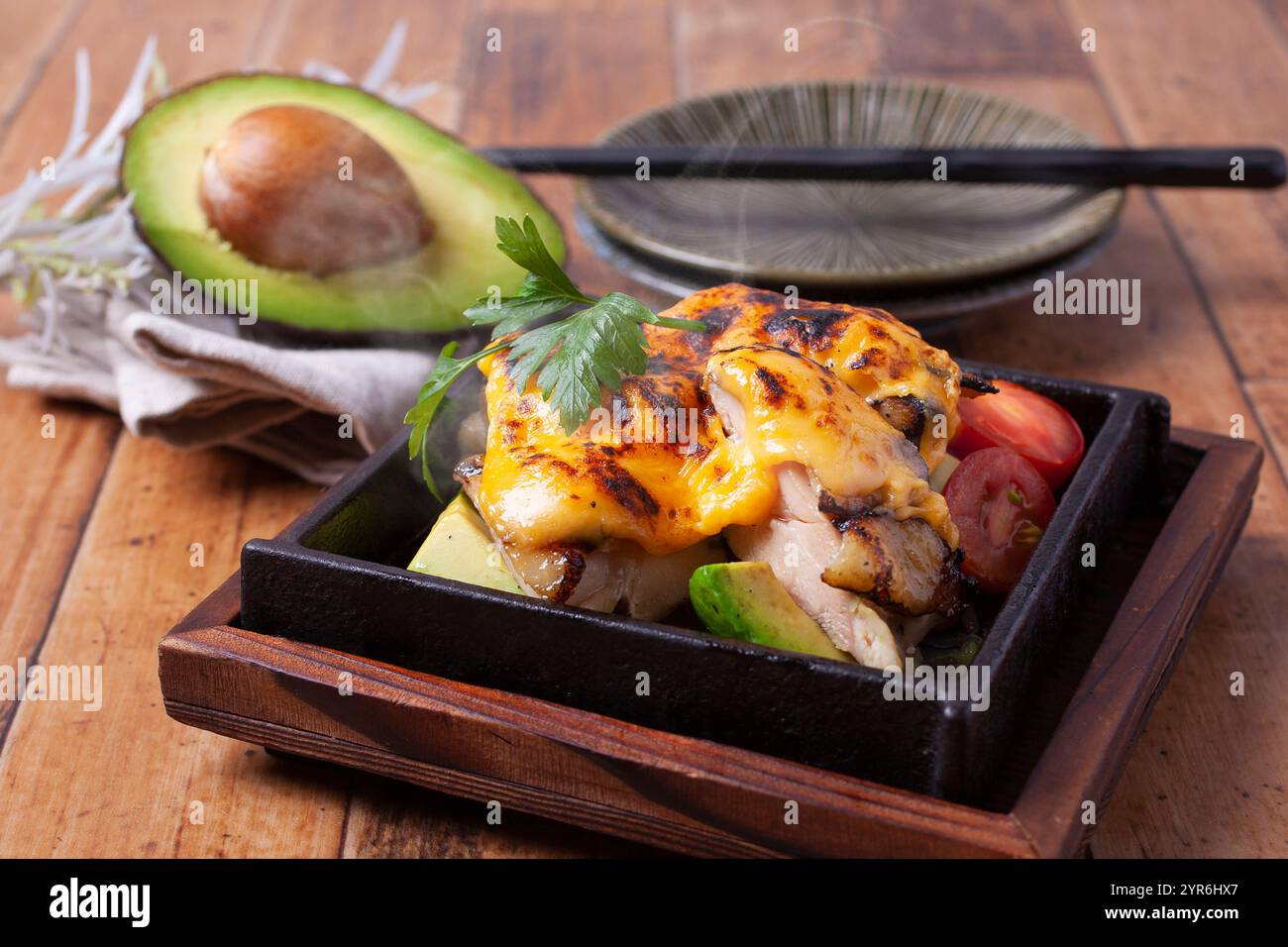 Chicken avocado grilled on teppan with cheese Stock Photo - Alamy