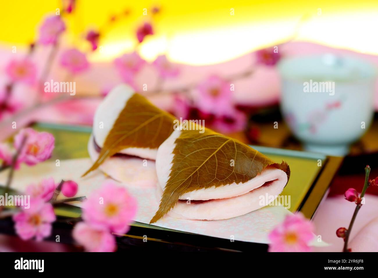 Sakura rice cake and red plum blossoms Stock Photo - Alamy