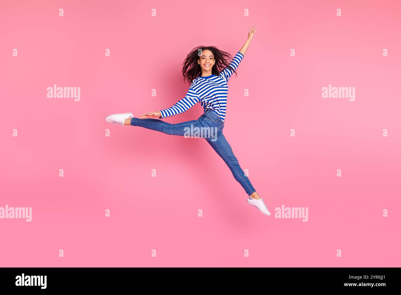 Full size photo of pretty young girl jumping rejoice isolated on pink ...