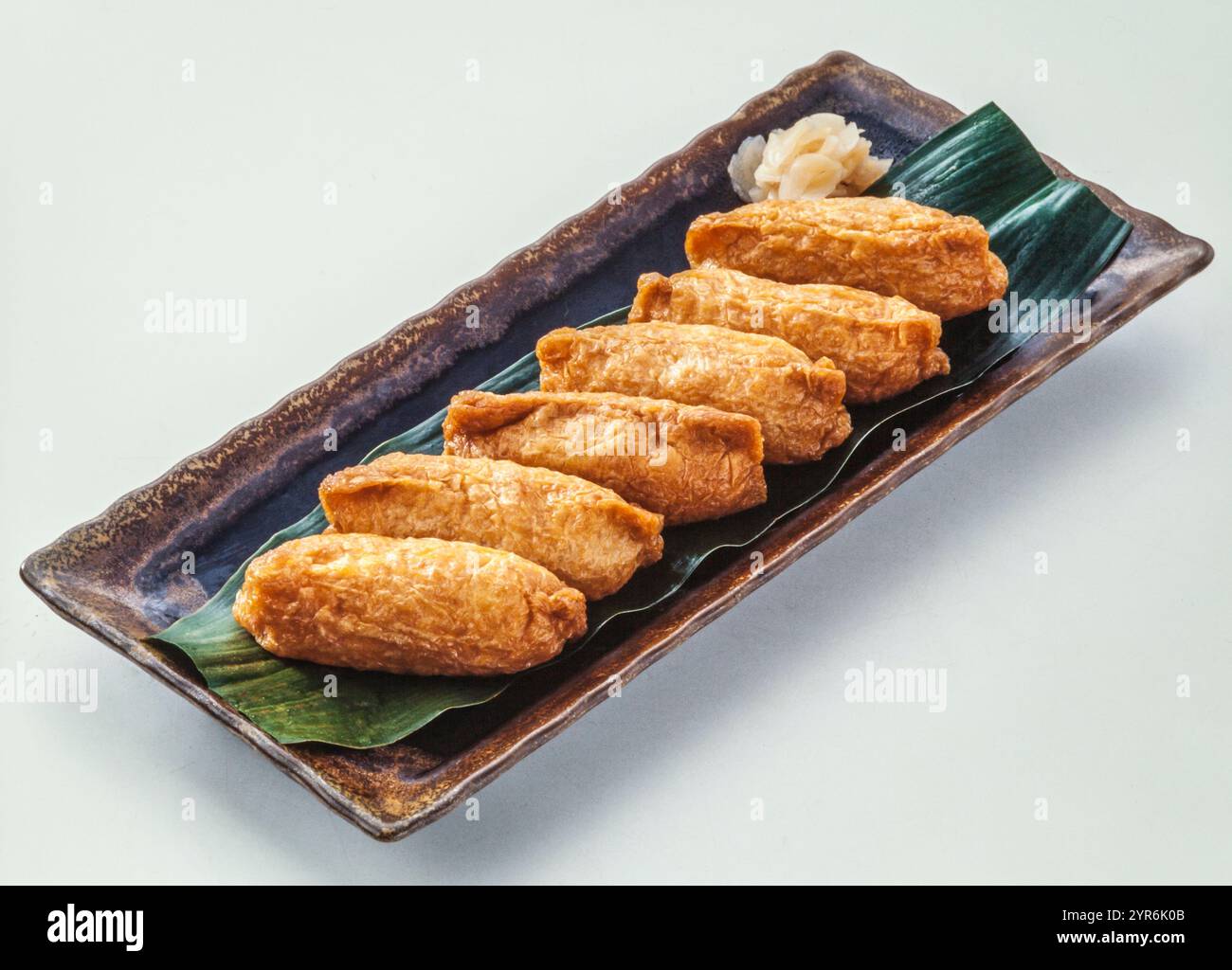 Fried tofu sushi Stock Photo - Alamy