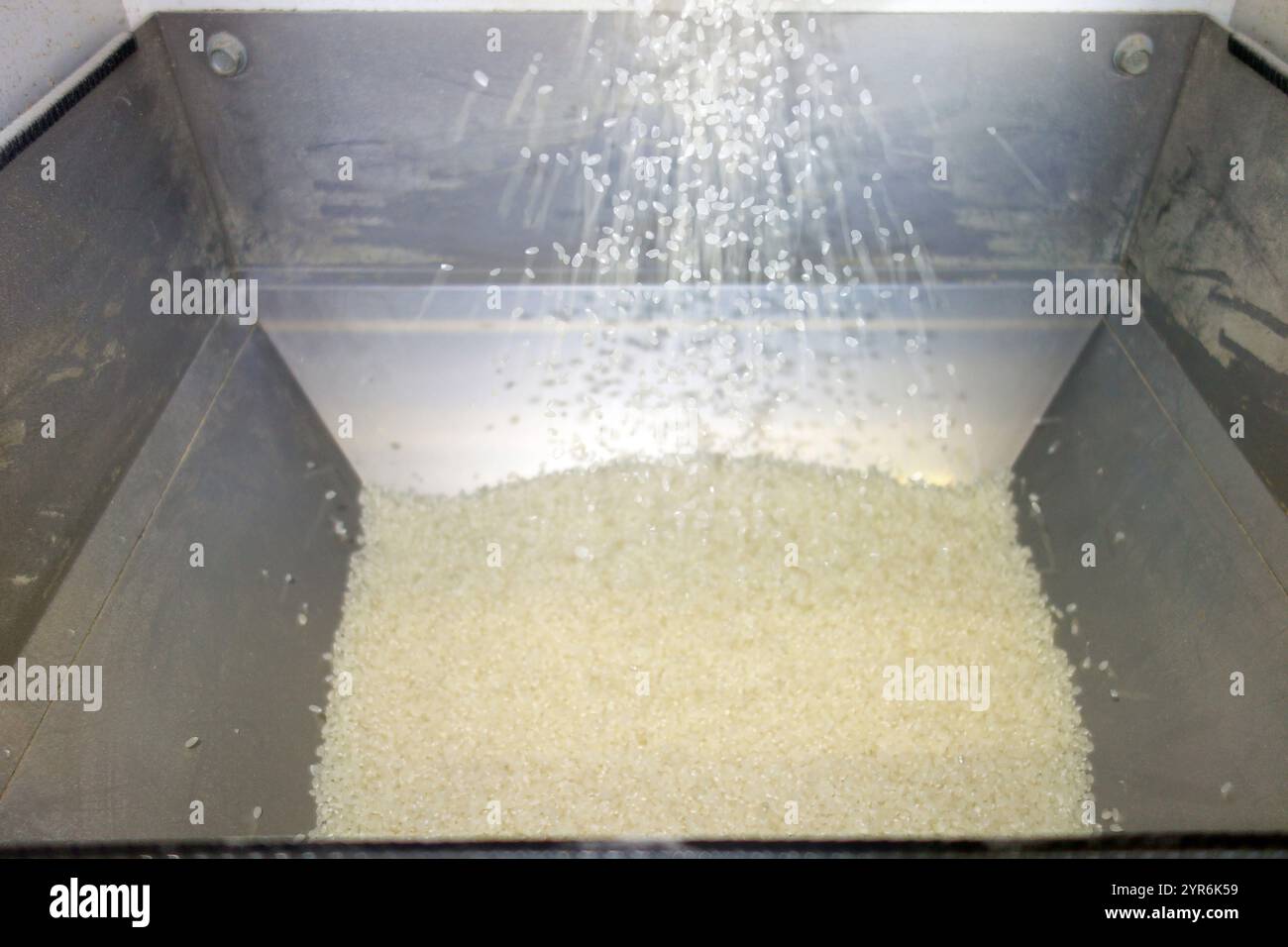 Rice milling machine Stock Photo - Alamy