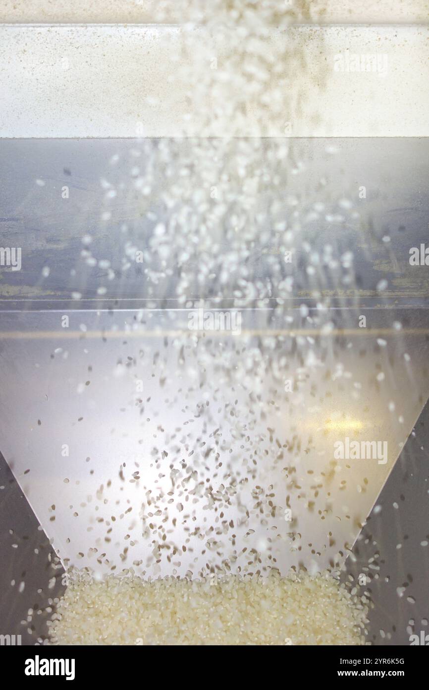 Rice milling machine Stock Photo - Alamy