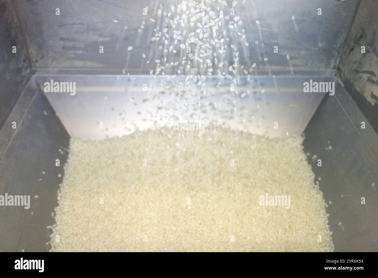 Rice milling machine Stock Photo - Alamy