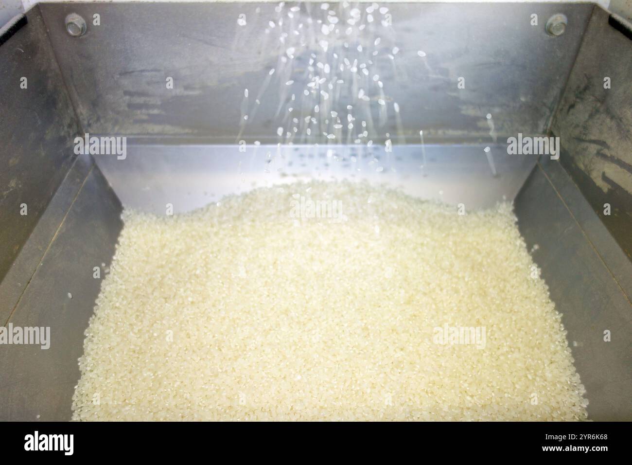 Rice milling machine Stock Photo - Alamy