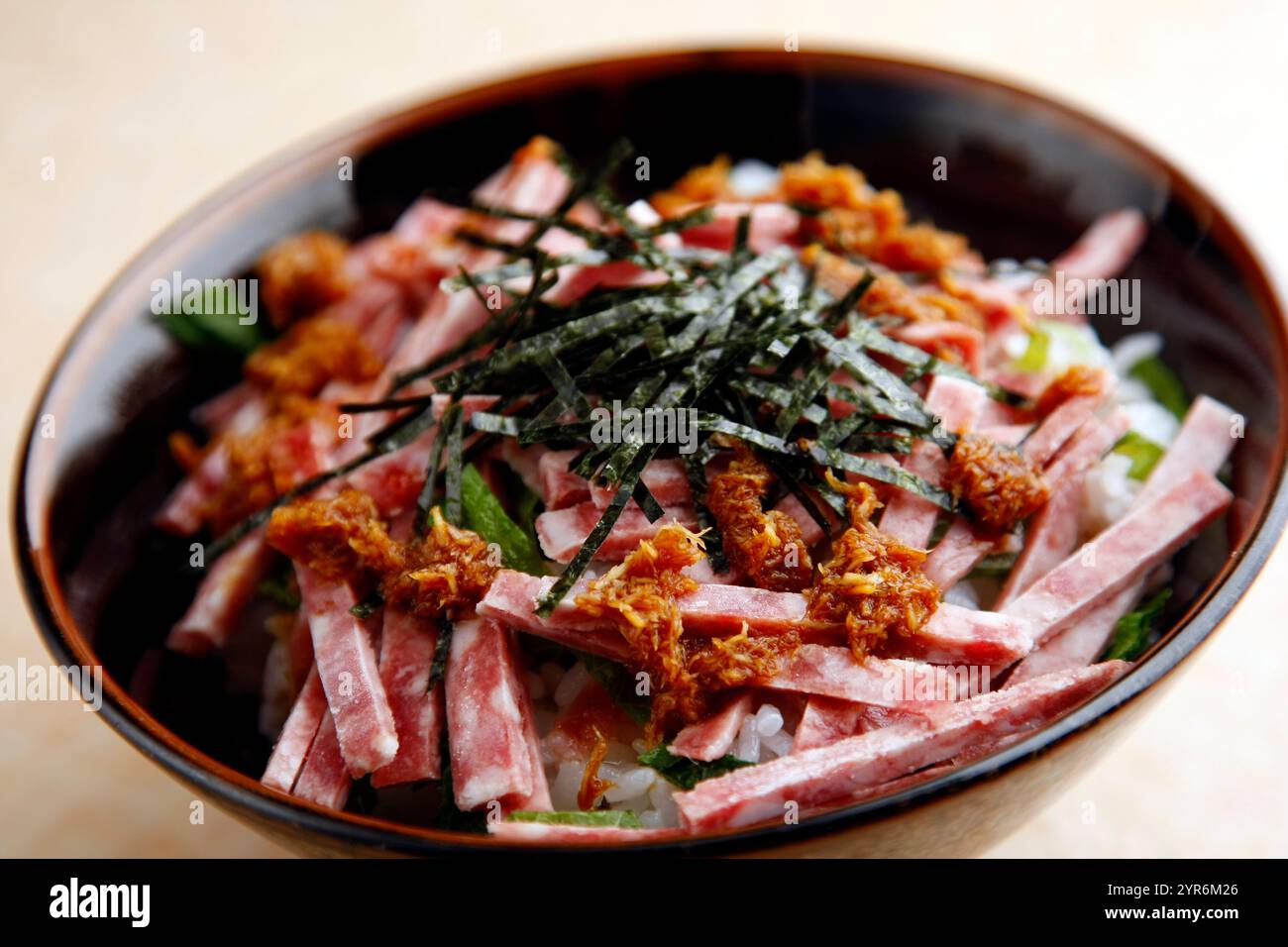 Raw beef sashimi bowl Stock Photo - Alamy
