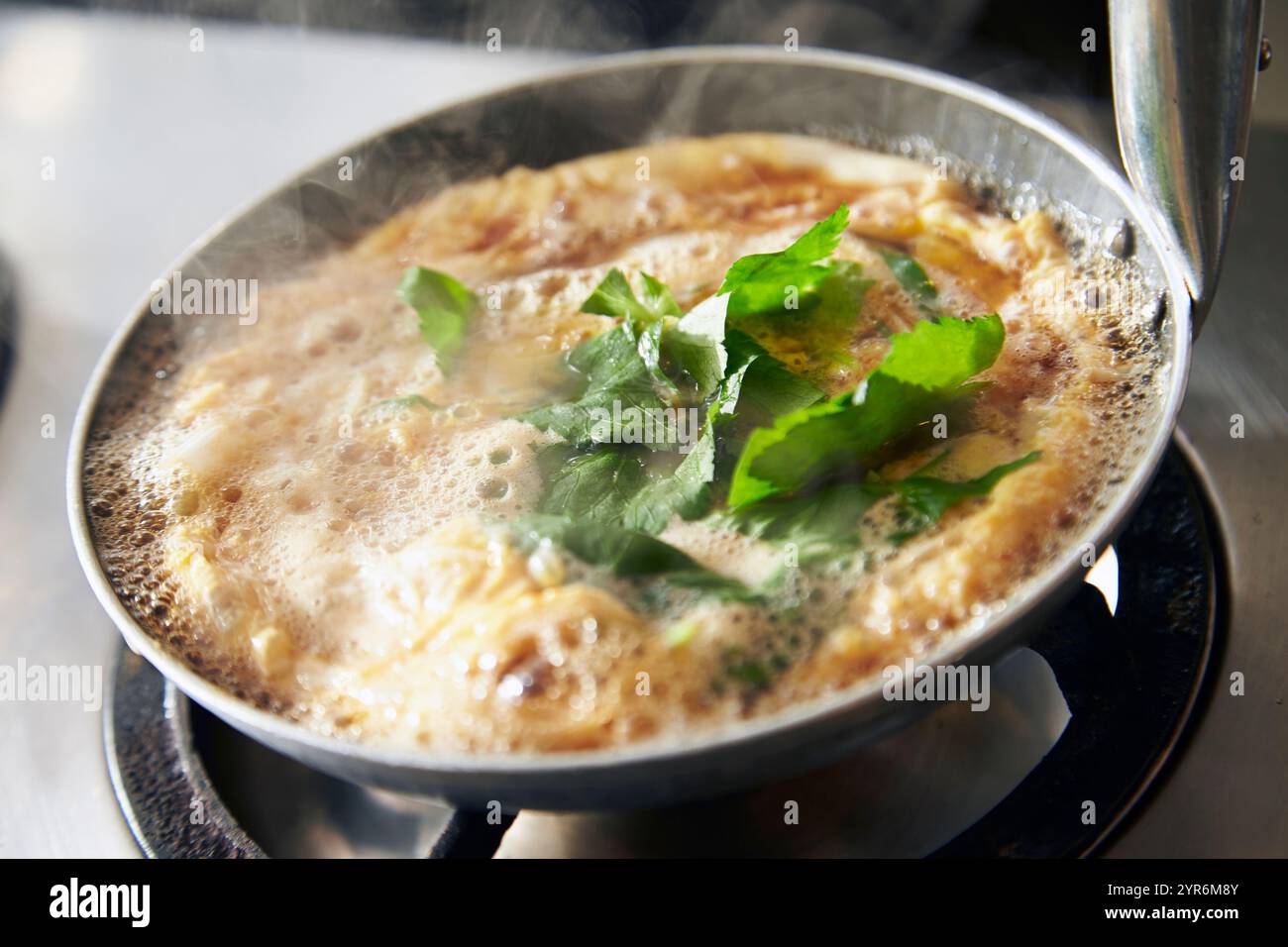Photograph of the process of making tamagodon Stock Photo - Alamy