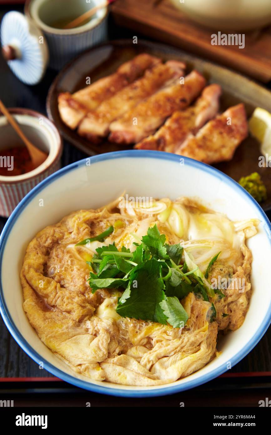 Tamago-don (bowl of rice topped with an egg Stock Photo - Alamy