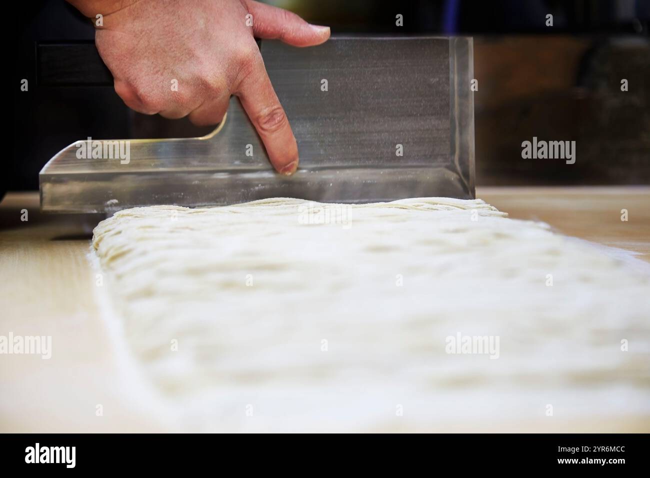Photograph of cutting handmade buckwheat noodles, Soba Stock Photo - Alamy