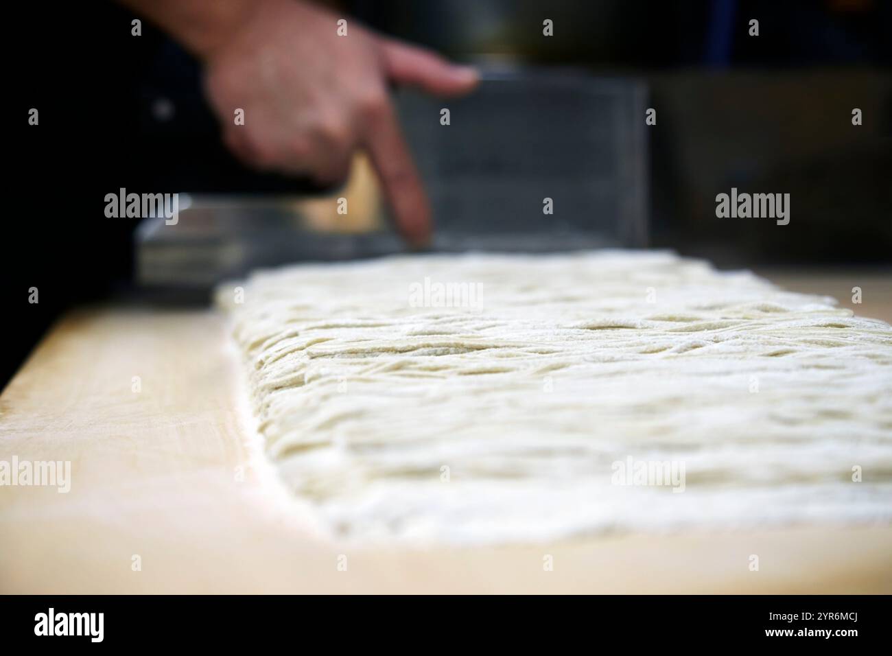 Photograph of cutting handmade buckwheat noodles, Soba Stock Photo - Alamy