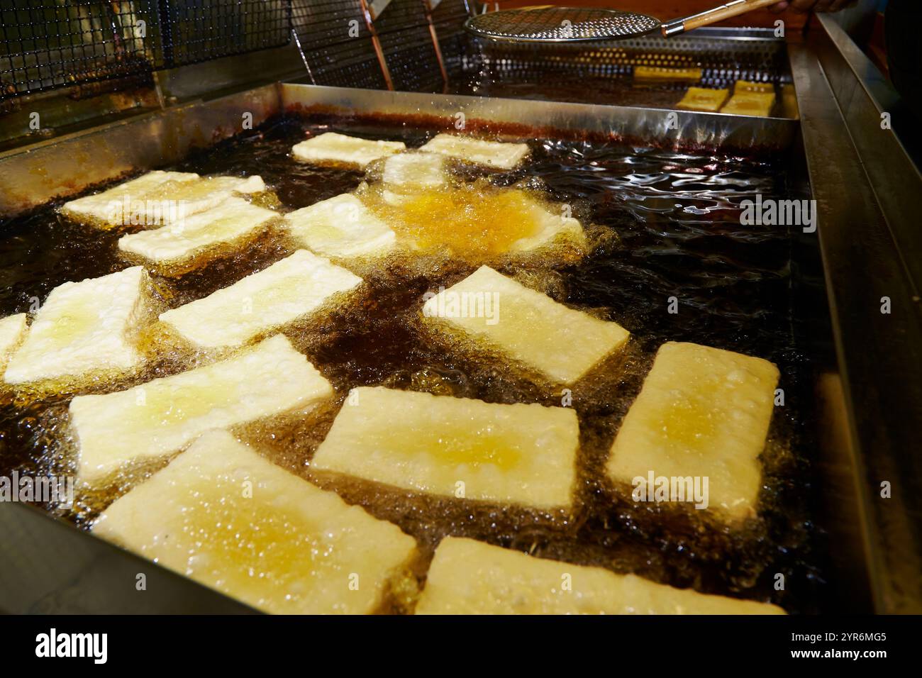 Deep frying cooking process hi-res stock photography and images - Alamy