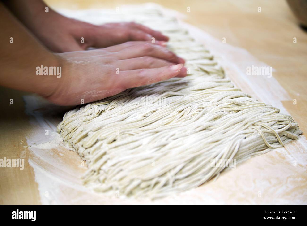 Photograph of holding handmade buckwheat noodles, Soba Stock Photo - Alamy