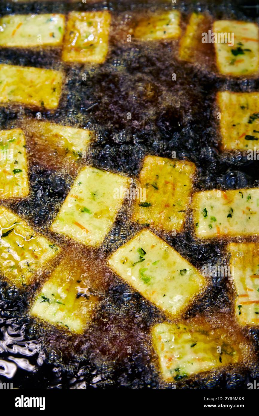 Photograph of deep-fried tofu with vegetables being deep-fried Stock ...