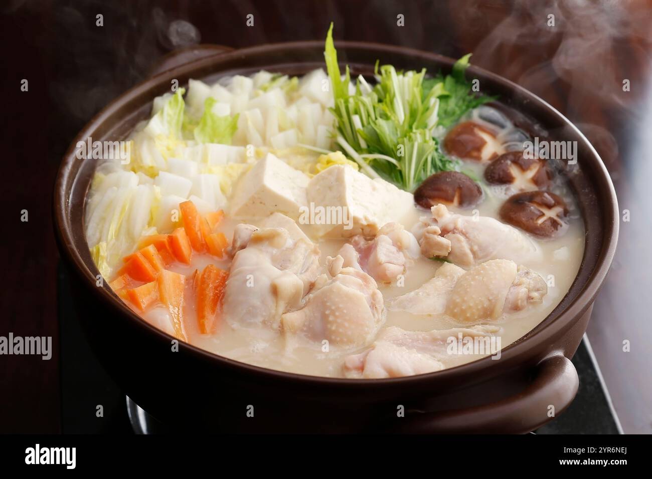 Chicken cooked in a pot Stock Photo - Alamy